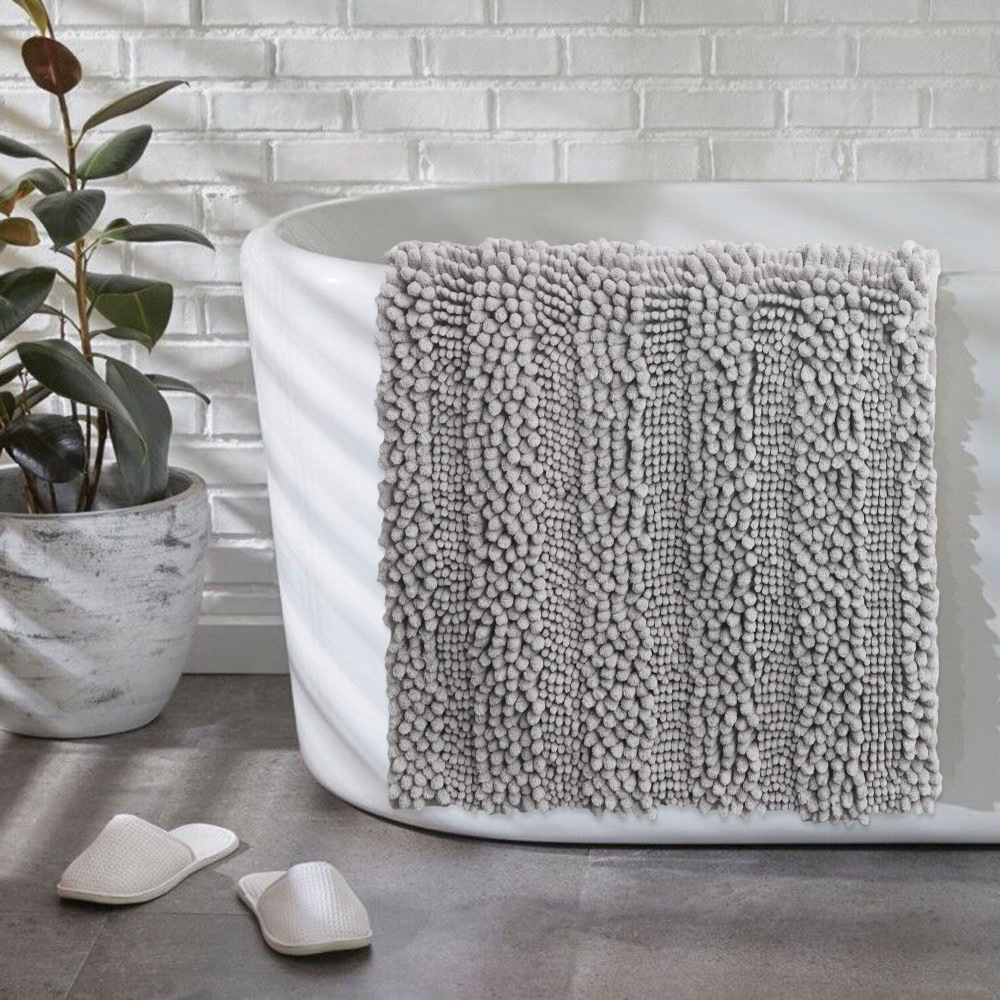 Soft grey furry bathroom mat